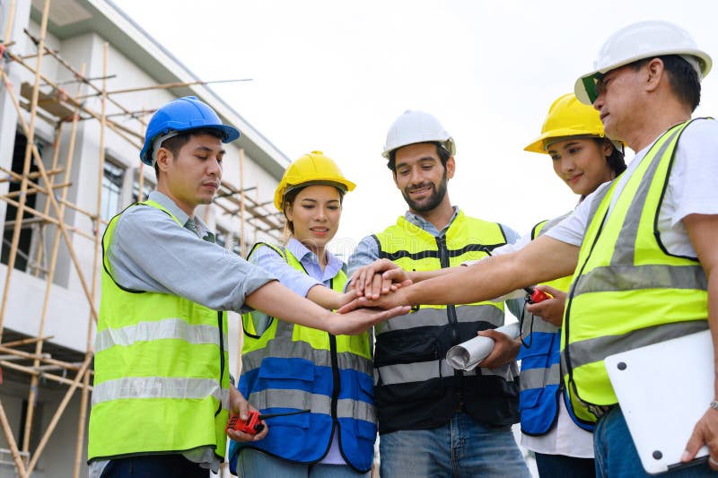 Group of Contractors, Engineers and Formats in Safety Vests with ...