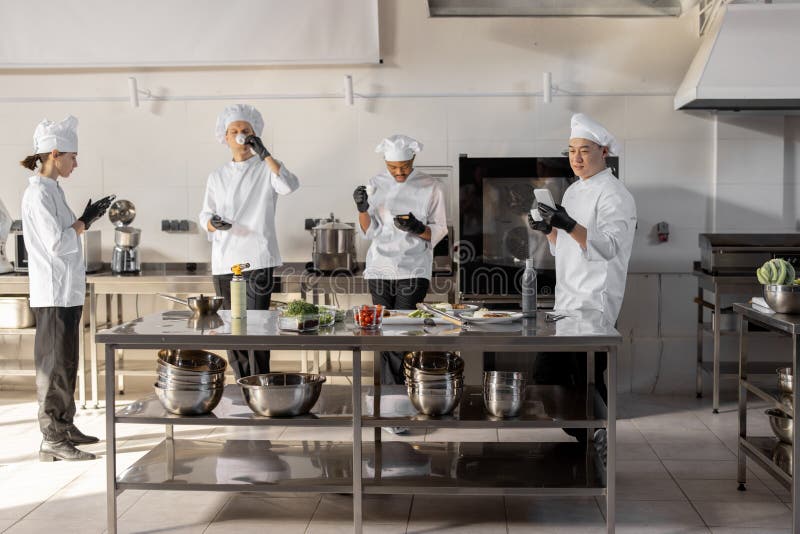 Group of Cooks during a Coffee Break in the Restaurant Kitchen Stock ...