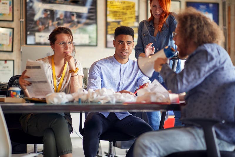 Group of Coworkers Having Competition Together; Casual Workplace ...