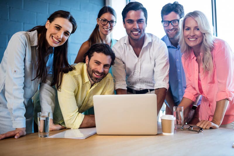 Group of Coworkers Watching a Laptop Stock Photo - Image of bureau ...