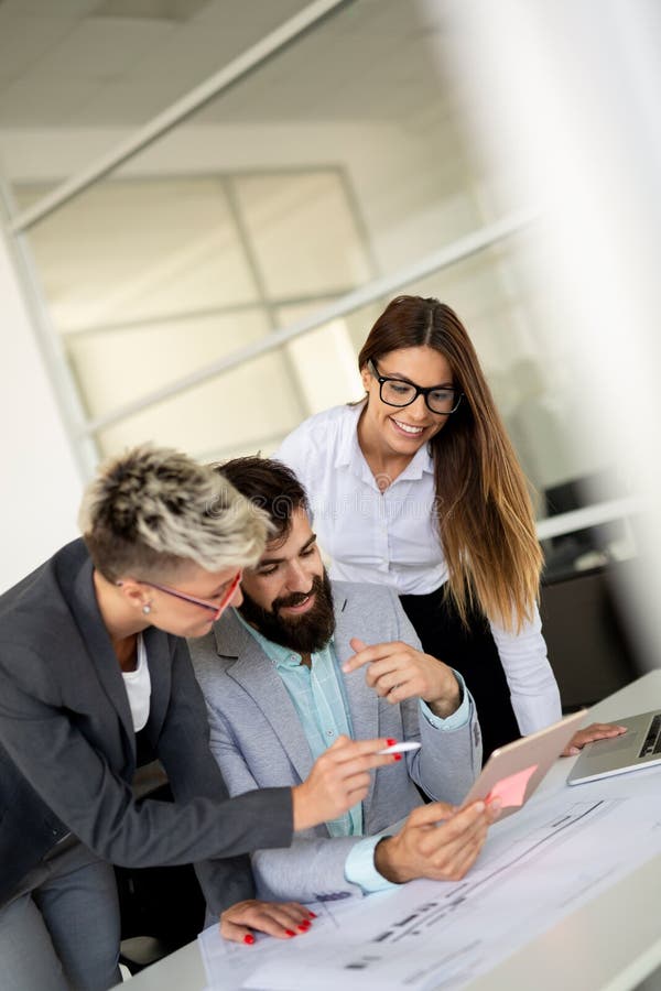 Group of Coworkers Working Together on Business Project in Modern ...