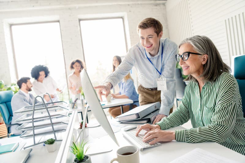 Professional Team Collaborating on a Project Inside a Modern Office ...