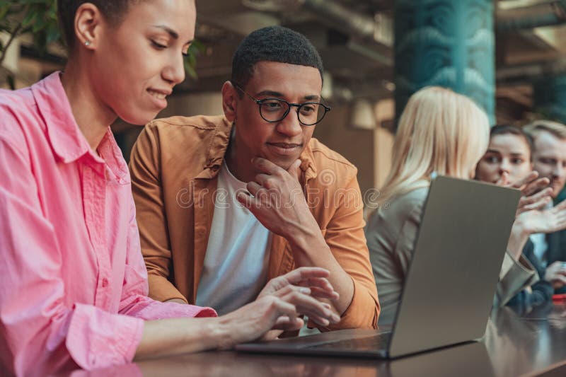 Group of Coworkers Working Together and Talking at Modern Office ...