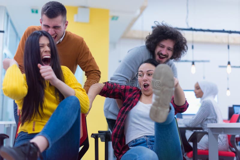 Group of Creative Office Workers Collaborate Together Making Joke with ...