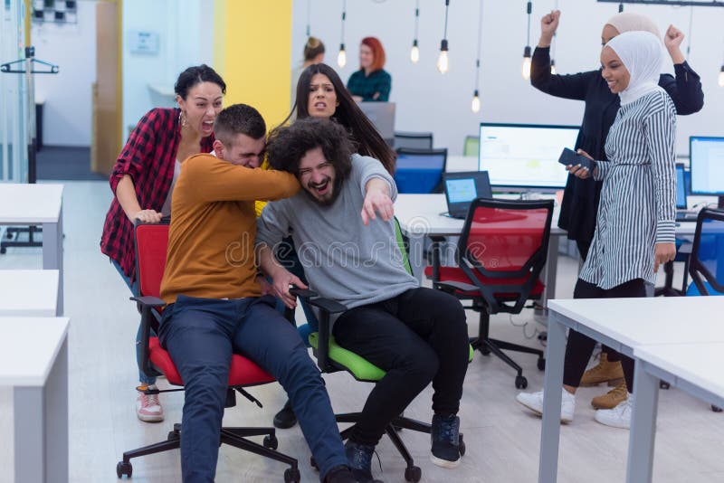 Group of Creative Office Workers Collaborate Together Making Joke with ...