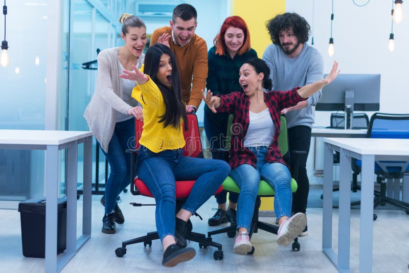 Group of Creative Office Workers Collaborate Together Making Joke with ...