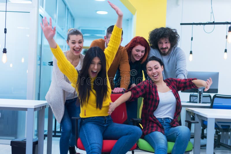 Group of Creative Office Workers Collaborate Together Making Joke with ...