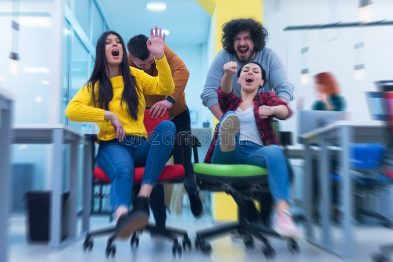 Group of Creative Office Workers Collaborate Together Making Joke with ...