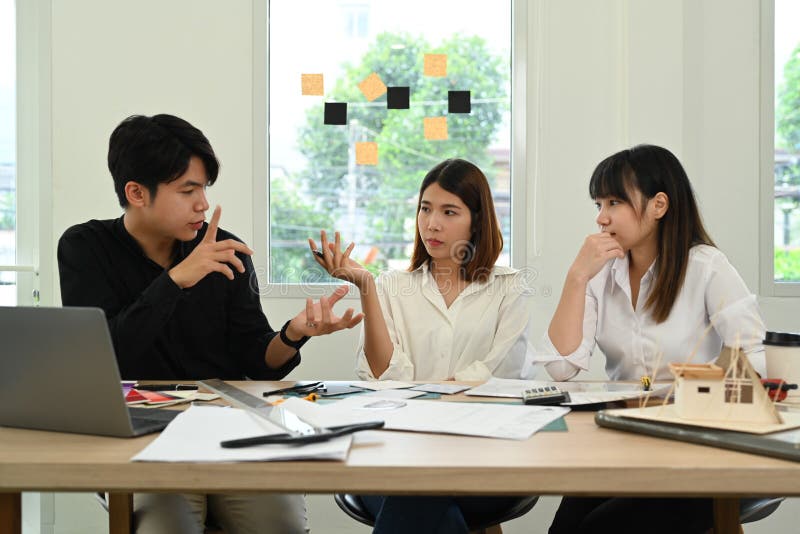 Group of Creative People Working Together of Architectural Project ...