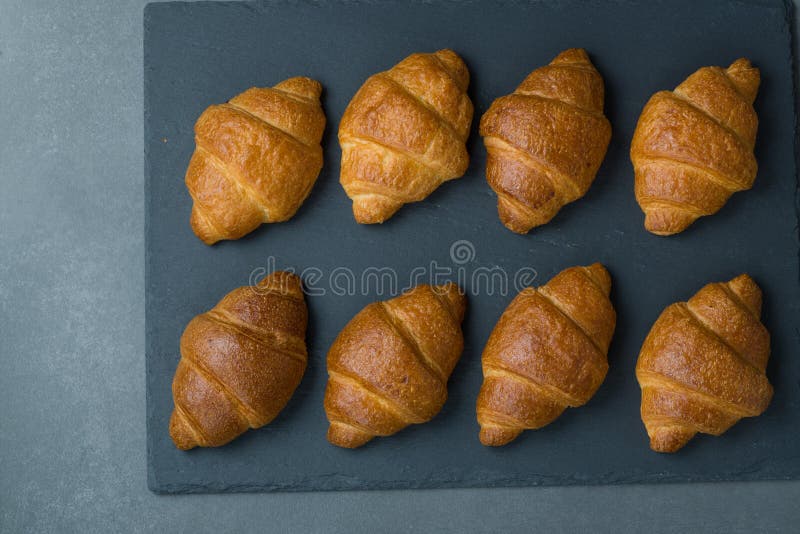 Group of Croissant Arranged in Two Rows and Ready at the Table for ...