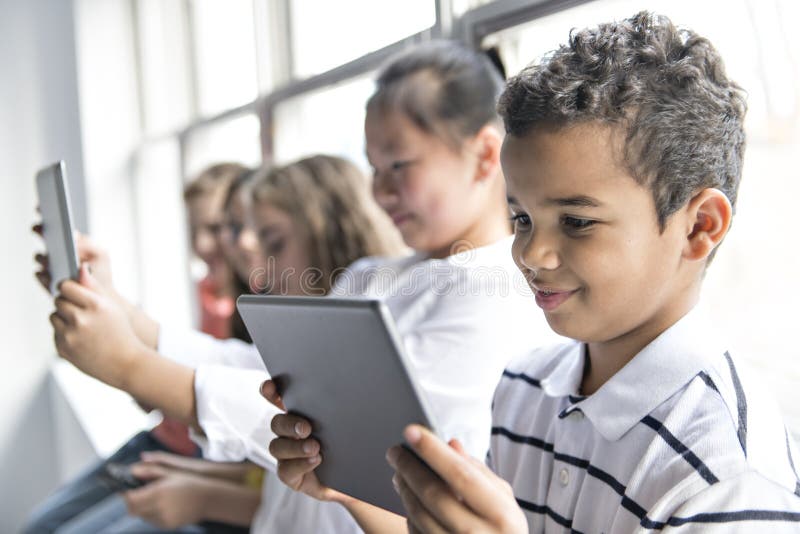 Group of Curious Children Watching Stuff on the Tablet Screen Stock ...