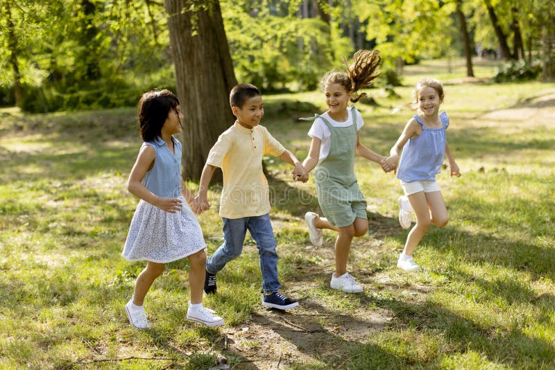 Group of Asian and Caucasian Kids Having Fun in the Park Stock Image ...