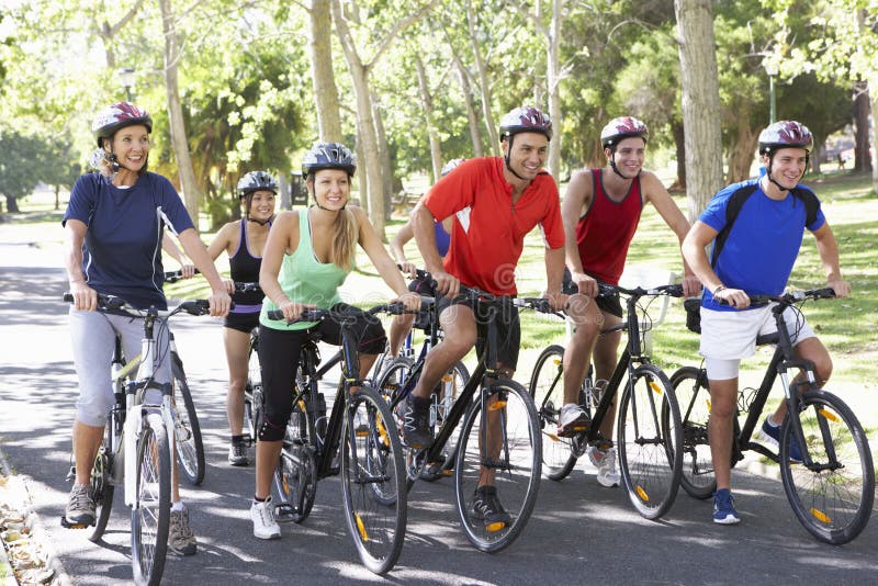 Group of Cyclists on Cycle Ride through Park Stock Image - Image of ...