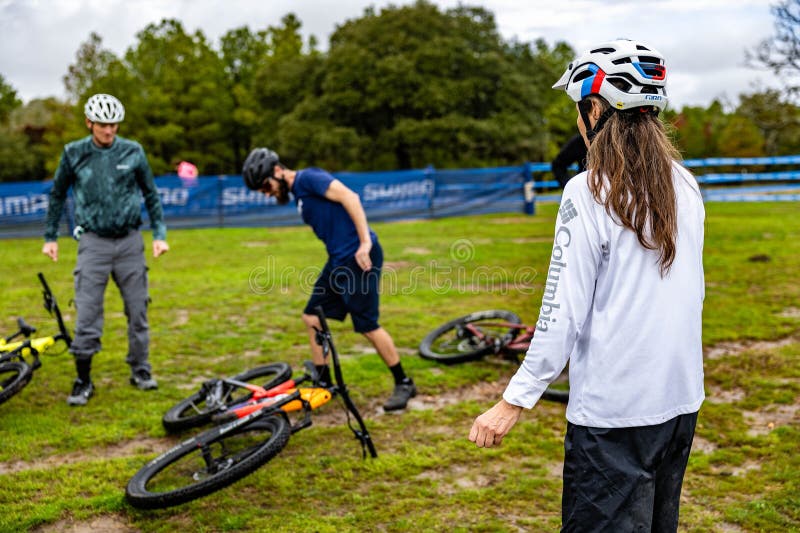 Group of Cyclists in a Park Preparing for a Ride with Their Mountain ...