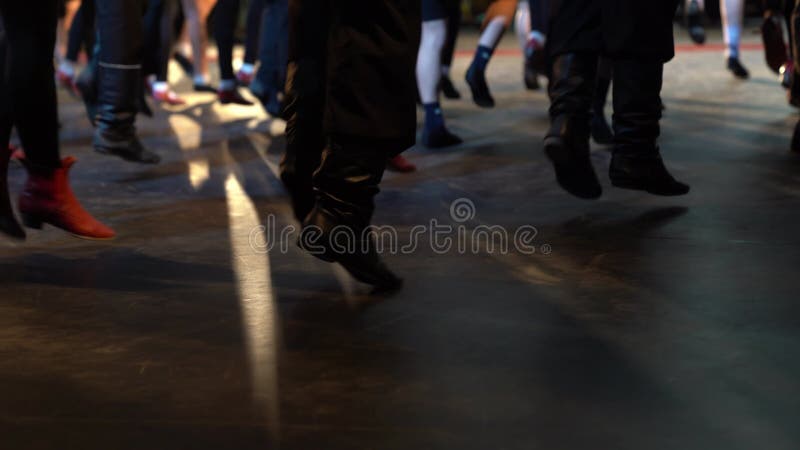 Group Dance. Rear View of the Dancers. a Group of People on Stage ...