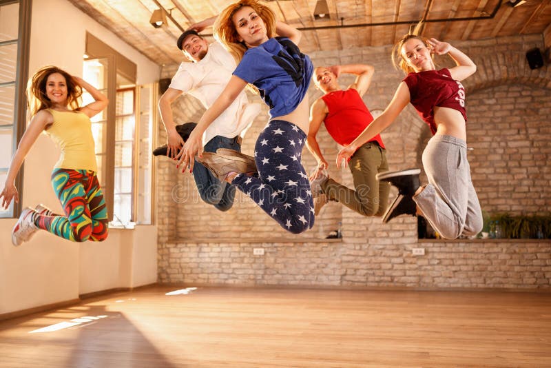Group of Dancers Jumping Together Stock Image - Image of energy, people ...