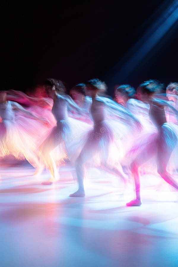 A Group of Dancers Moves Gracefully in a Circle, Their Flowing Dresses ...