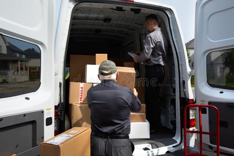 Group of Delivery Man with a Parcel. Stock Image - Image of post ...