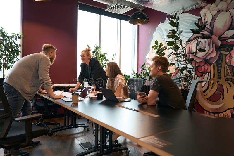 Group of Design Professionals in Modern Office Stock Image - Image of ...