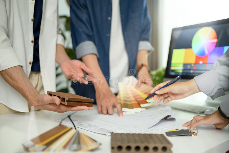 Group of Designers of Interior Choosing Material Samples, Working ...