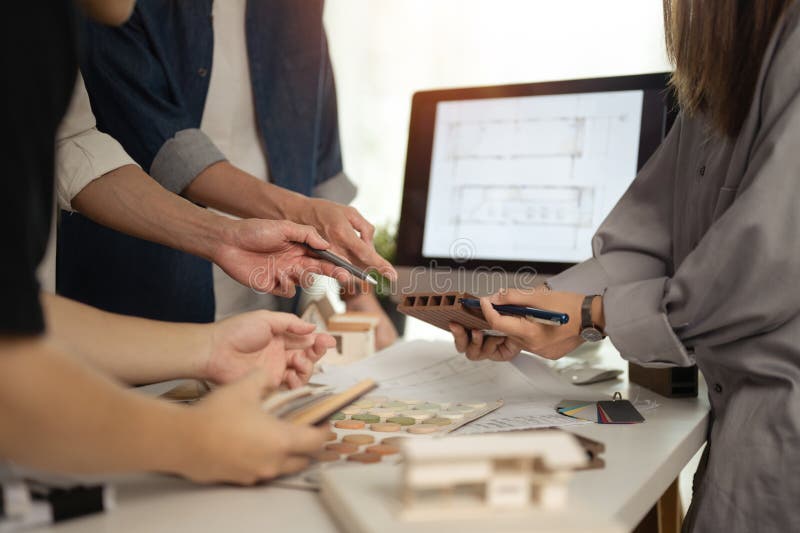 Group of Designers of Interior Choosing Material Samples, Working ...