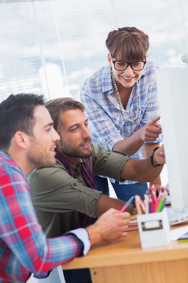 Group of Designers Working on a Computer Stock Photo - Image of monitor ...