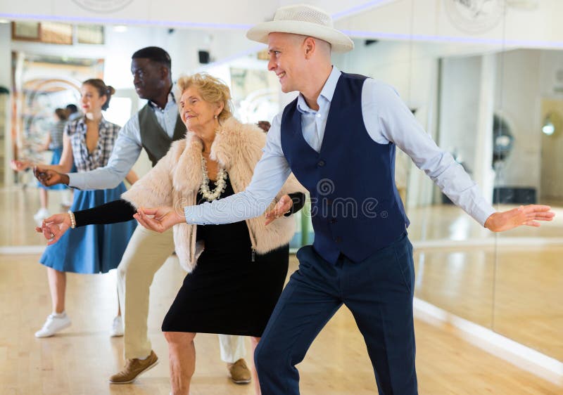 Group of Different Age Dancers Preparing Swing Performance Stock Image ...