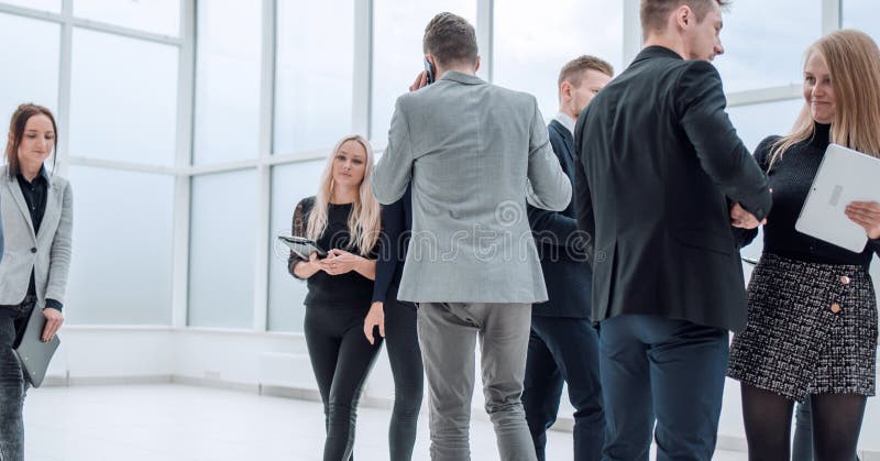 Group of Different Business People Passing in the Office Lobby. Stock ...