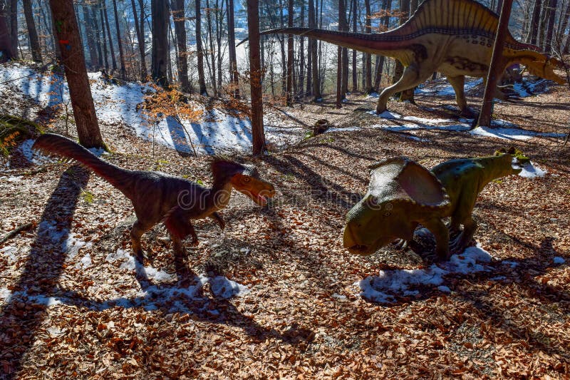 A Group of Dinosaurs in the Park Stock Photo - Image of trail, branch ...