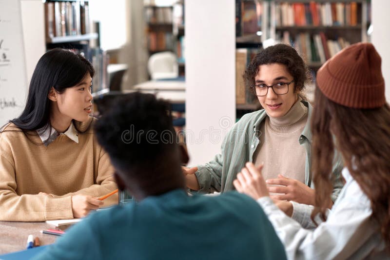 Group Discussion in Library Stock Image - Image of friend, teen: 309301779