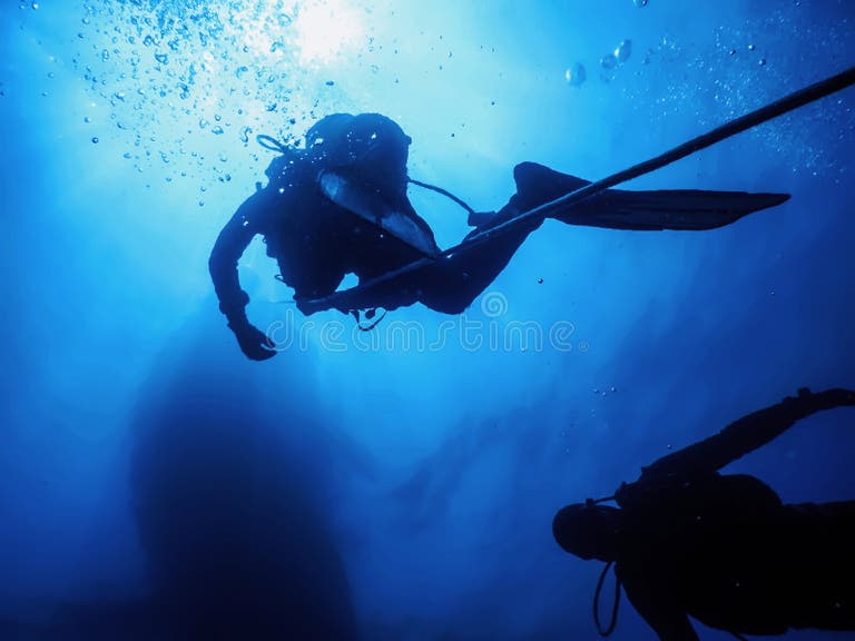 Group of Divers on Safety Stop Underwater Bubbles Stock Image - Image ...