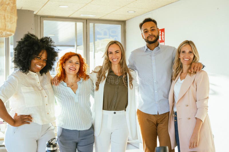 Group of Diverse Business People Smiling while Standing Together in the ...