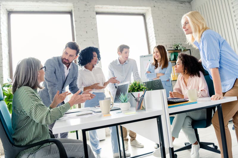 Diverse Office Team Collaborating Passionately in a Professional and ...