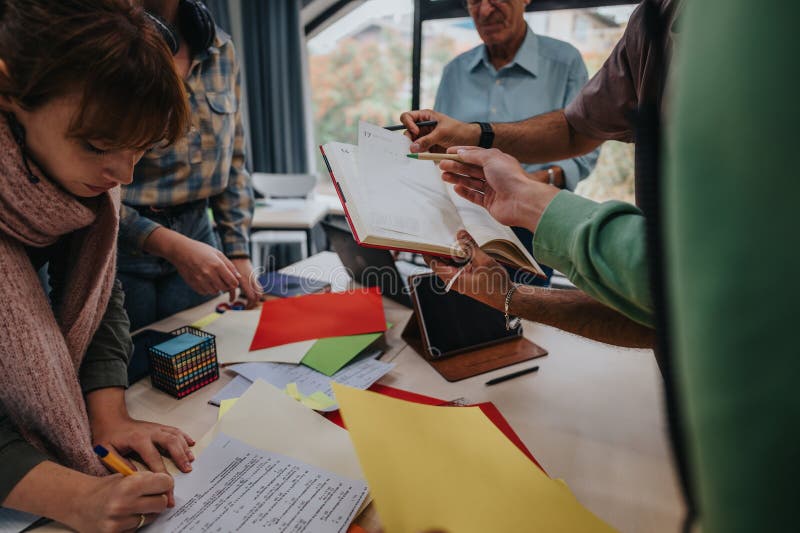 College Students Collaborating with Professor in Modern Classroom ...