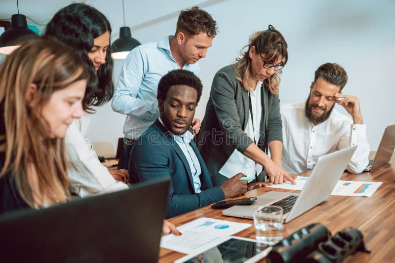 Multiethnic Colleagues Working on Project Stock Photo - Image of ...