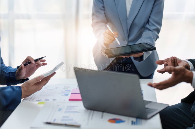 Group of Diverse Creative Discussion about Analyzing Data Financial ...