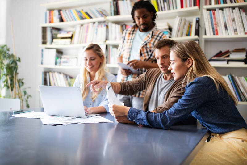 Group of Diverse Designers, Business People Brainstorming on Meeting in ... Group of Diverse Designers, Business People Brainstorming on Meeting in ...