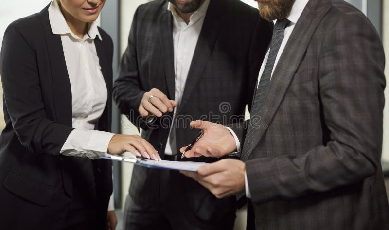 Group of Diverse Employees Holding Clipboard for daily Planning ...