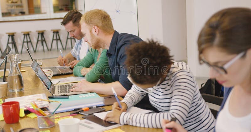Team working on project stock photo. Image of table - 101853280