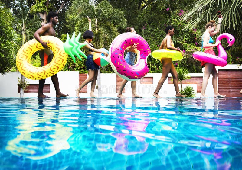 Group of Diverse Friends Enjoying Summer Time by the Pool with I Stock ...