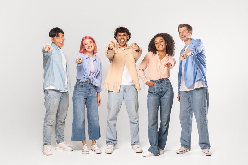 Group of Diverse Friends Pointing at Camera in Studio Stock Photo ...