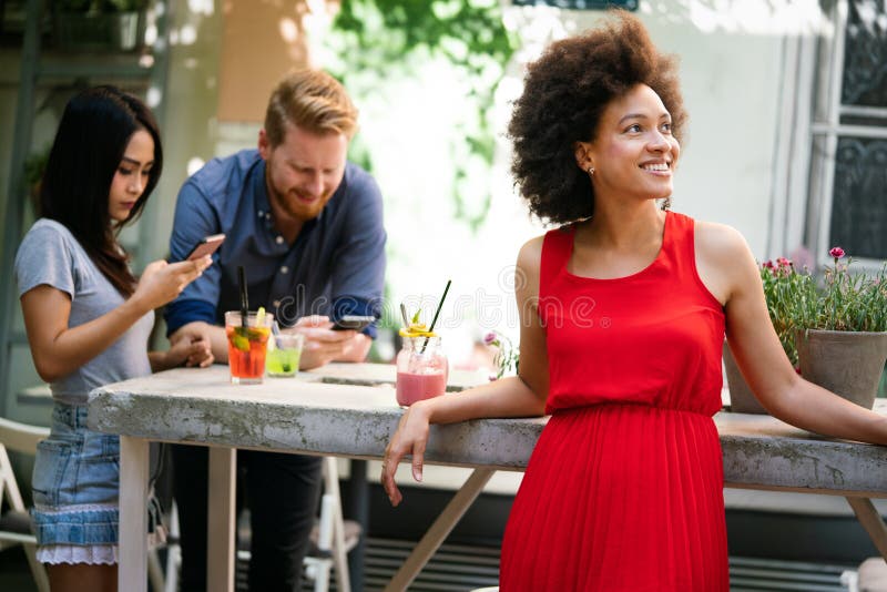 Group of Diverse Friends Talking and Having Fun at Cafe Outdoor Stock ...