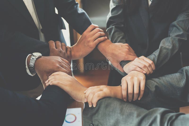 Group of Diverse Hands Holding Each Other Support Together Teamwork ...