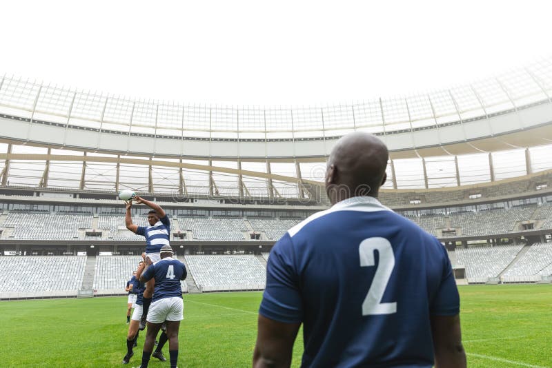 Group of Diverse Male Rugby Player Playing Rugby Match in Stadium Stock ...