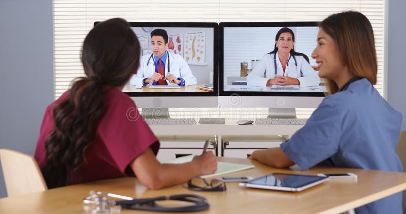Group of Diverse Medical Doctors Video Conferencing Stock Photo - Image ...