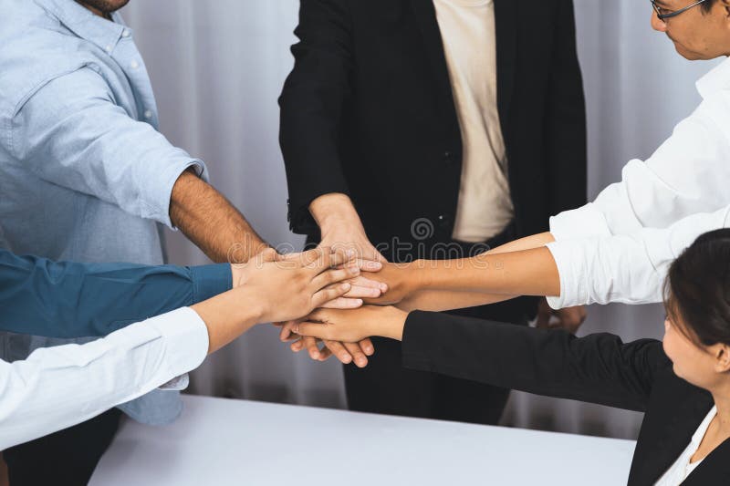 Group of Diverse Office Worker Join Hand Together in Office. Prudent ...