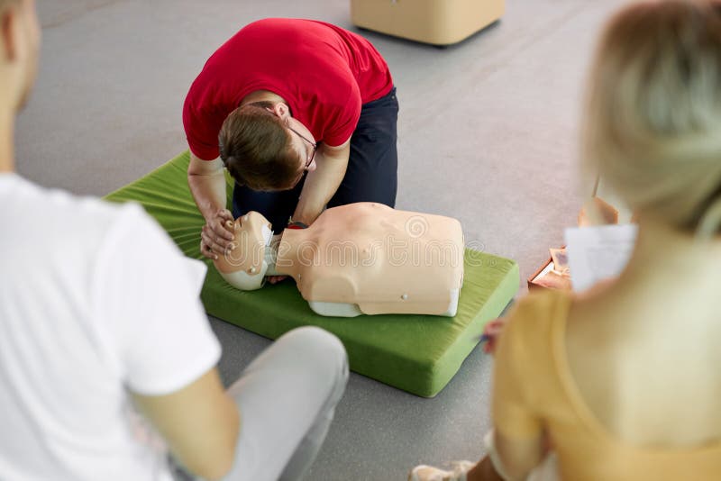 Group of Diverse People Practice First Aid Training by Hand Stock Image ...