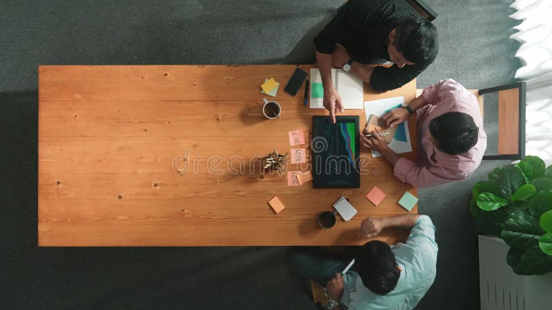 Group of Diverse People Sharing Idea while Writing at Sticky Notes ...