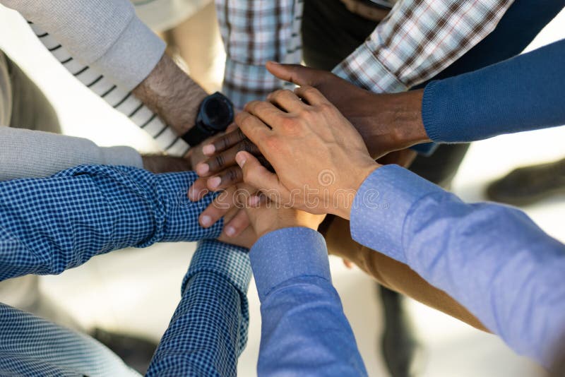 Group of Diverse People Stacking Hands in the Middle. Stock Image ...
