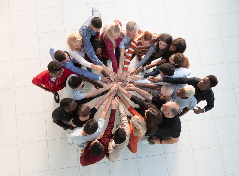 Group of Diverse People Standing in a Circle and Joining Their Palms ...